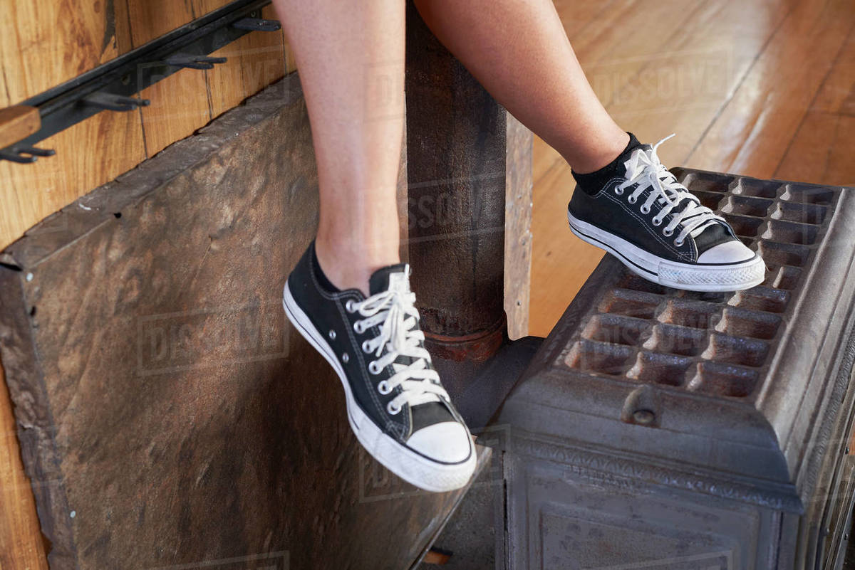 Close up of woman wearing shoes - Stock Photo - Dissolve