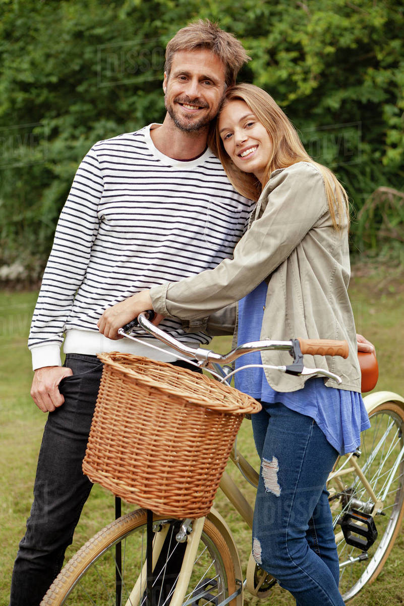 Portrait of smiling mid adult couple - Royalty-free Stock Photo | Dissolve