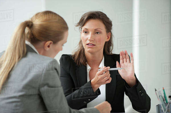 Businesswoman meeting with client - Royalty-free Stock Photo | Dissolve