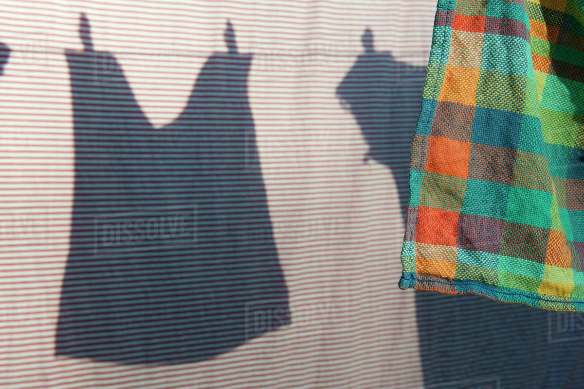 Laundry hanging on clothes-line - Stock Photo - Dissolve