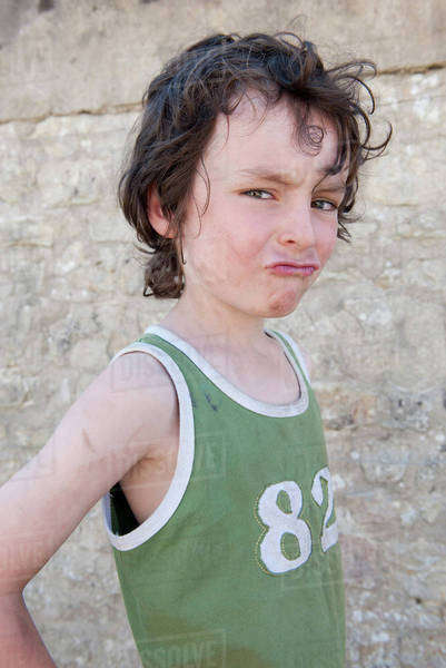 Boy making face - Stock Photo - Dissolve