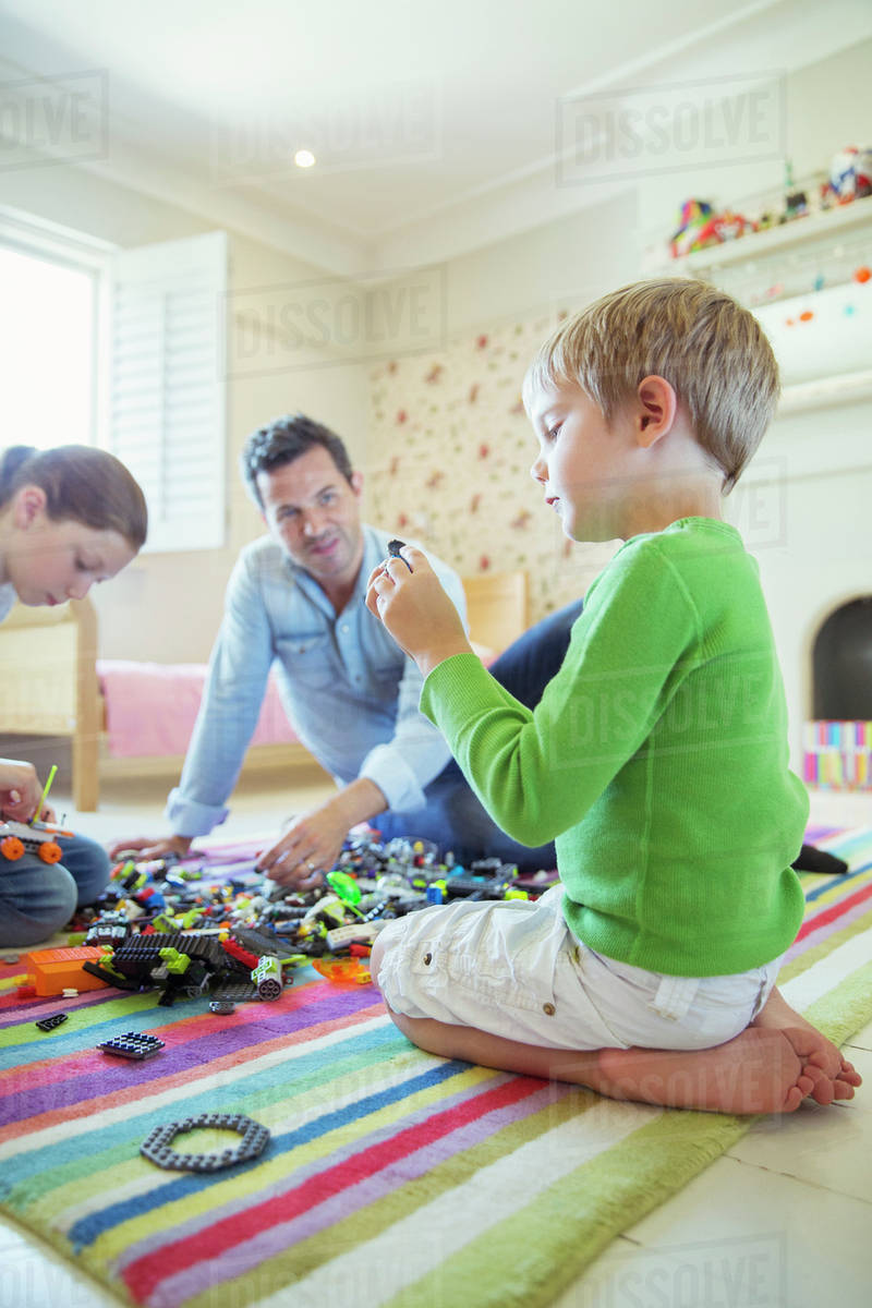Father playing with children - Royalty-free Stock Photo | Dissolve
