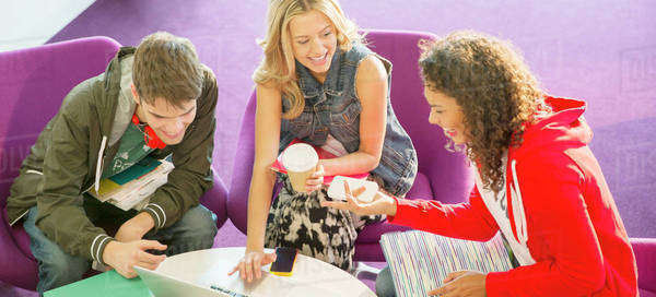 University students talking in lounge - Royalty-free Stock Photo | Dissolve