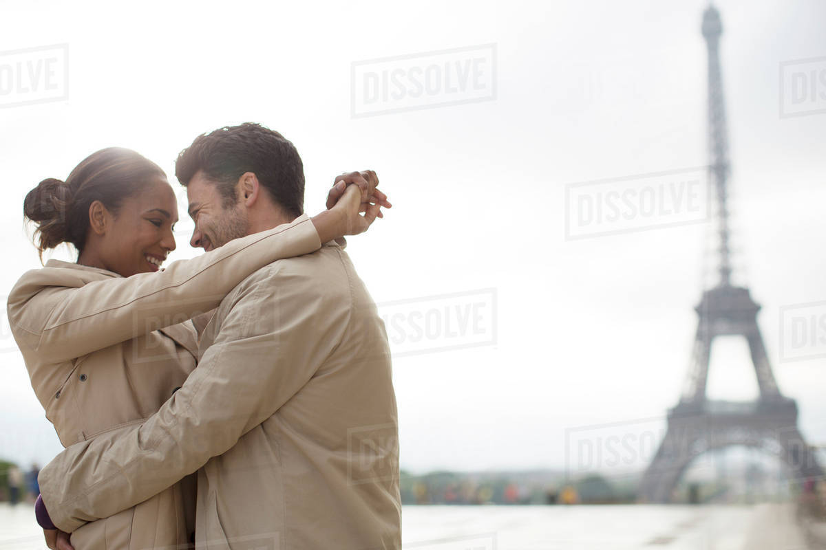 Couple hugging near Eiffel Tower, Paris, France - Royalty-free Stock ...
