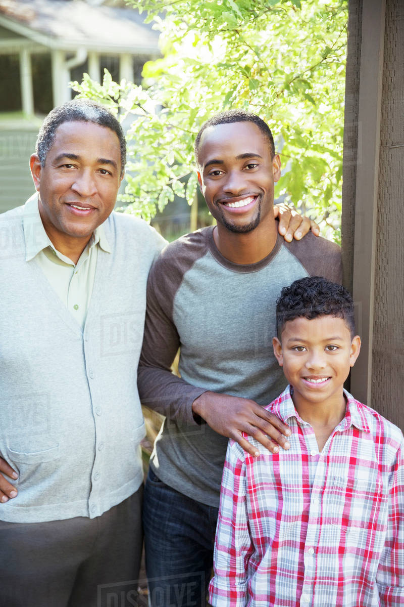 Portrait of smiling multi-generation men outdoors - Royalty-free Stock ...