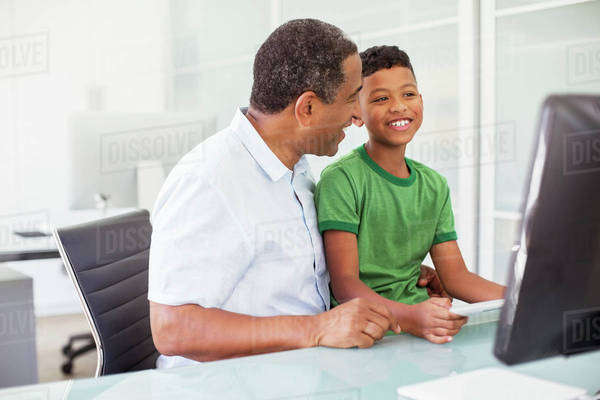 Grandfather and grandson using computer - Royalty-free Stock Photo ...