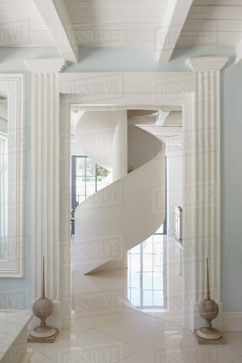Spiral staircase in luxury foyer - Stock Photo - Dissolve
