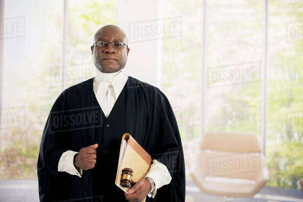 Portrait of serious judge - Stock Photo - Dissolve