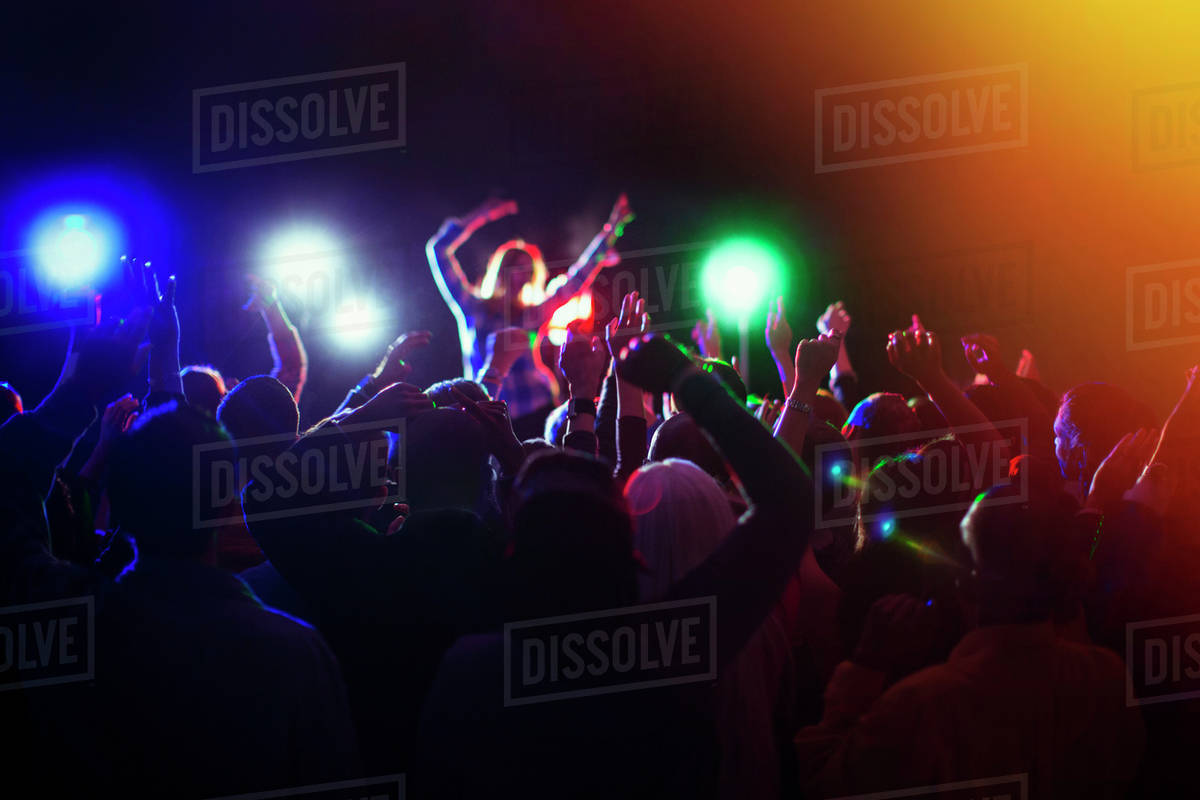 Audience enjoying music concert - Royalty-free Stock Photo | Dissolve
