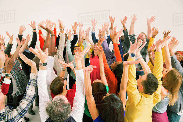 Diverse group cheering - Royalty-free Stock Photo | Dissolve