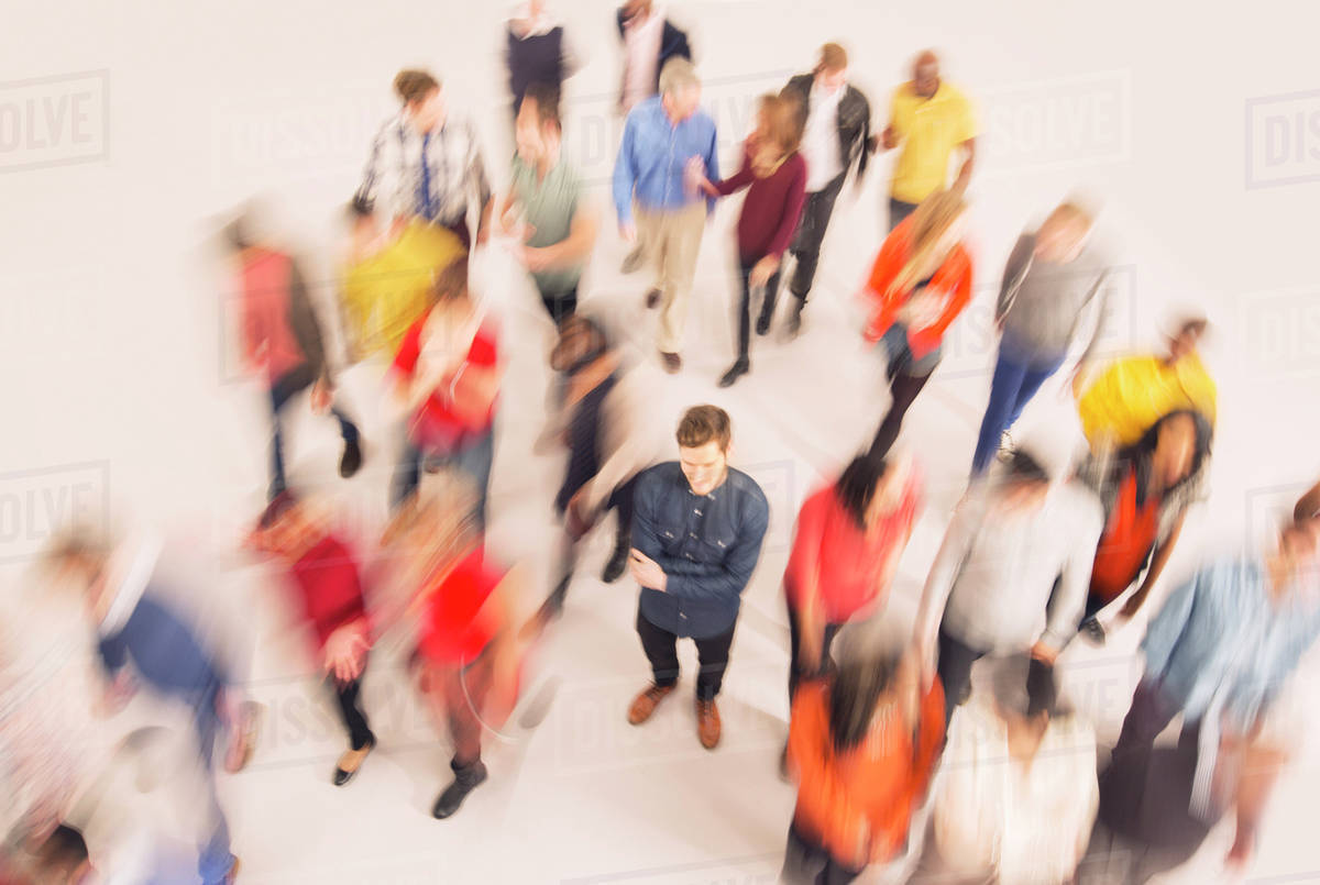 Businessman standing out from the crowd - Royalty-free Stock Photo ...