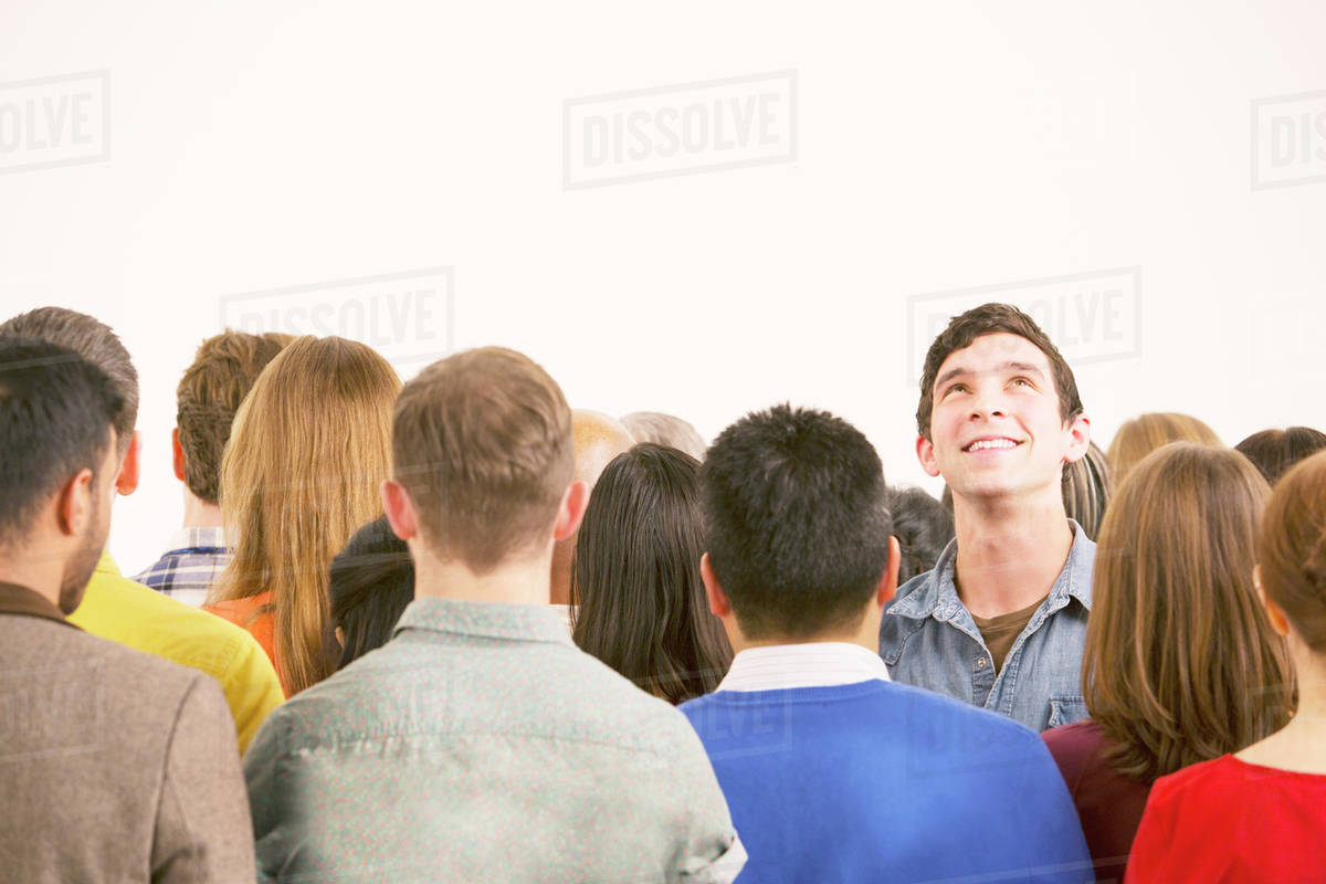 Man standing out from the crowd - Royalty-free Stock Photo | Dissolve