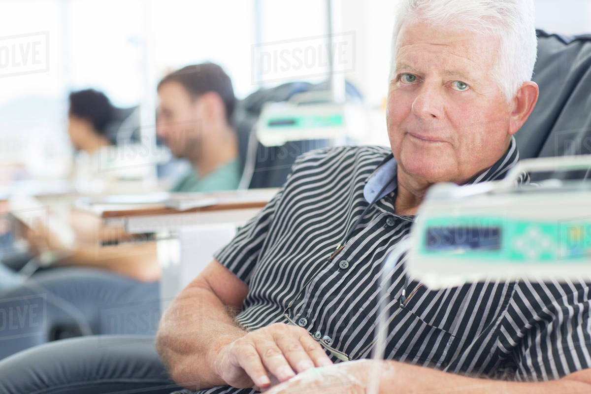 Portrait of patient undergoing medical treatment in outpatient clinic ...