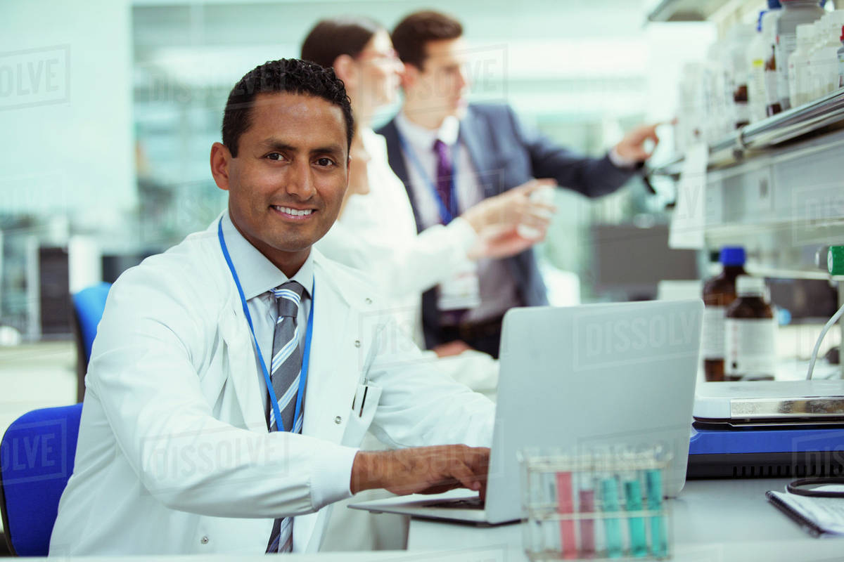 Scientist working on laptop in laboratory - Royalty-free Stock Photo ...