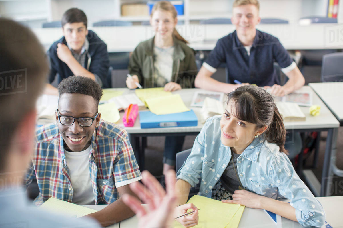 Cheerful High School students sitting in classroom - Royalty-free Stock ...