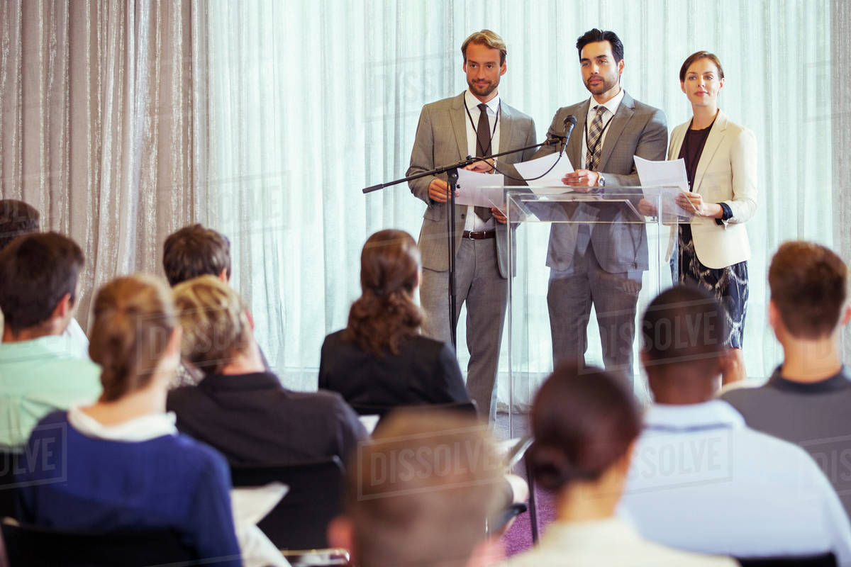 Business people giving presentation in conference room - Stock Photo ...