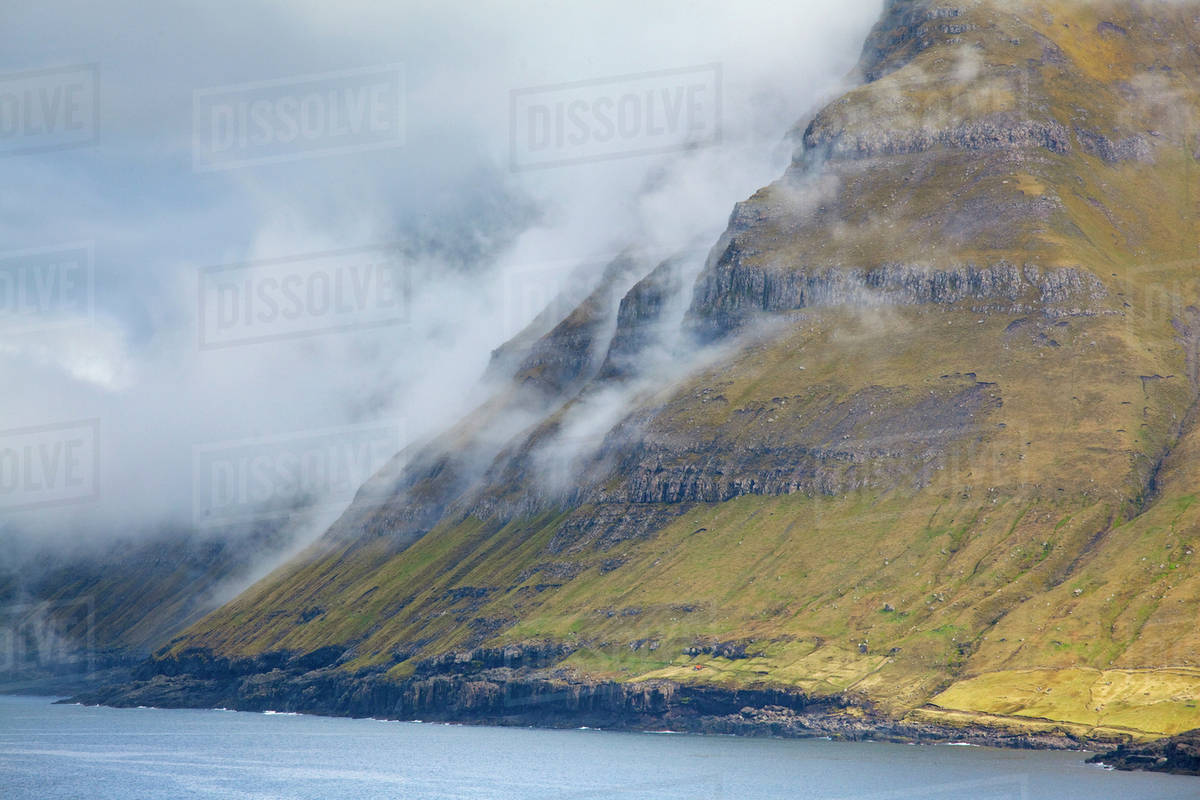 Clouds along cliffs, Funningur, Eysturoy, Faroe Islands - Royalty-free ...