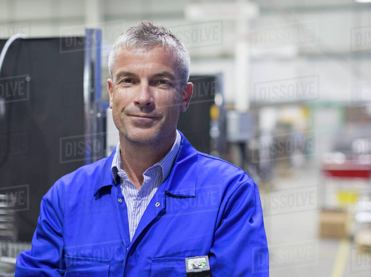 Portrait smiling worker in steel factory - Royalty-free Stock Photo ...