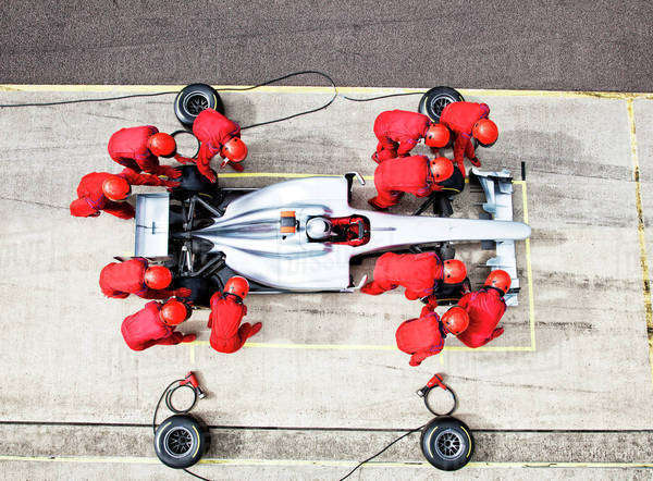 Racing team working at pit stop - Royalty-free Stock Photo | Dissolve