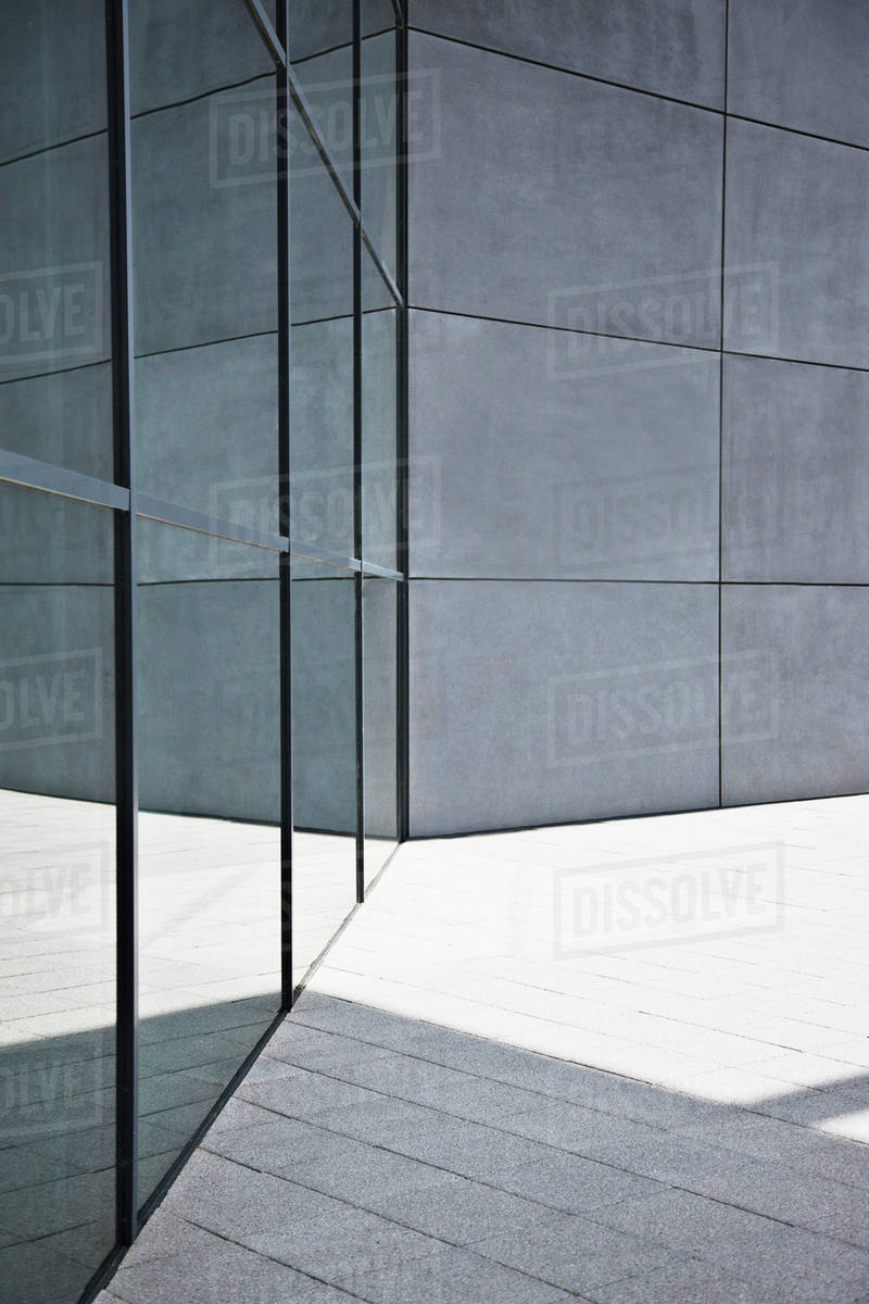 Glass and concrete walls of modern building - Stock Photo - Dissolve