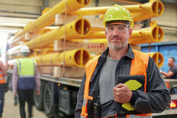 Portrait confident male engineer with digital tablet in factory - Stock ...