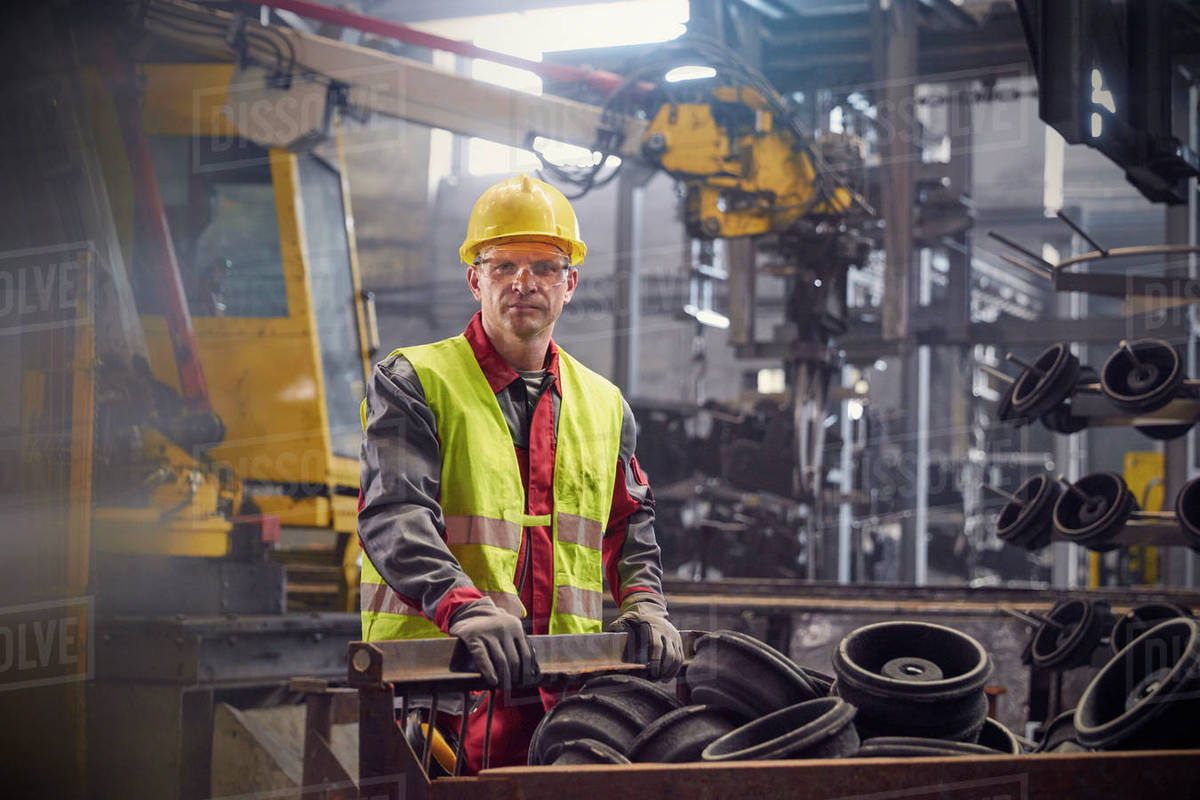 Portrait serious, confident steelworker in steel mill - Royalty-free ...