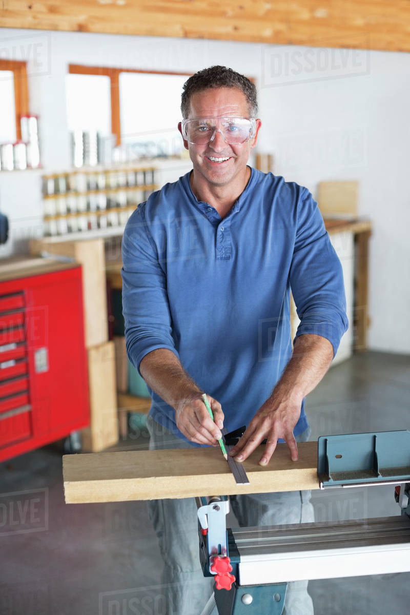 Man working in workshop - Royalty-free Stock Photo | Dissolve