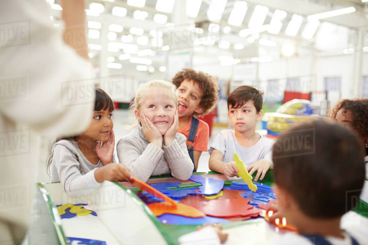 Kids playing in science center - Royalty-free Stock Photo | Dissolve