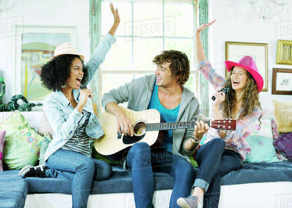 Friends singing and playing music together - Royalty-free Stock Photo ...