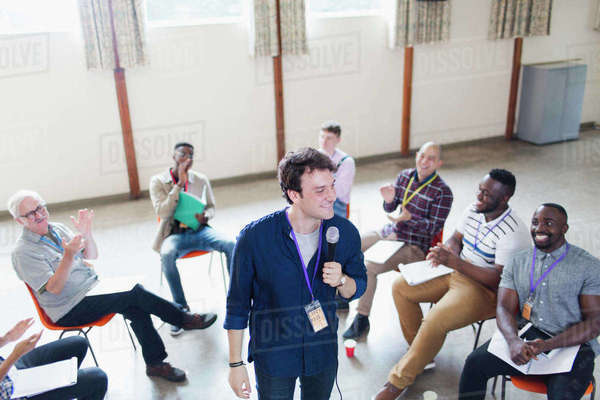 Group clapping for male speaker - Royalty-free Stock Photo | Dissolve