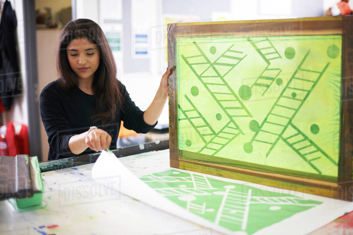 Female artist screen printing in studio - Royalty-free Stock Photo ...