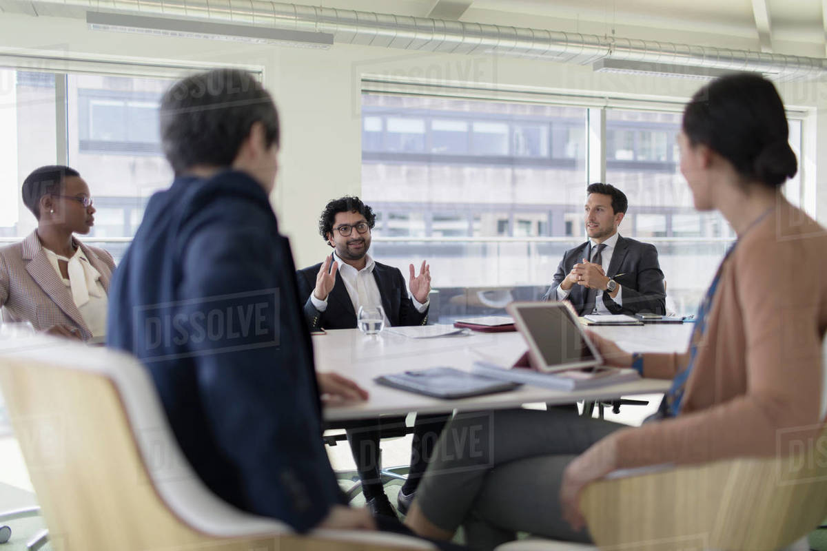 Business people talking in conference room meeting - Royalty-free Stock ...