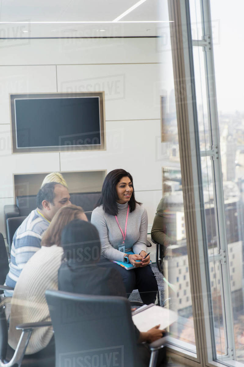 Business people listening in conference room meeting - Royalty-free ...
