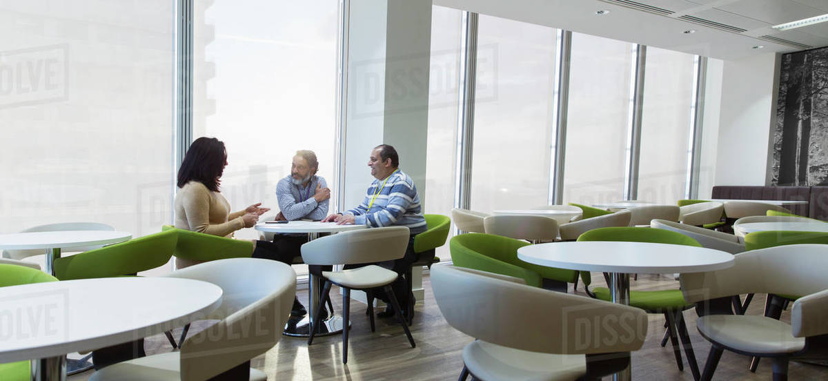 Business people meeting in office cafeteria - Royalty-free Stock Photo ...