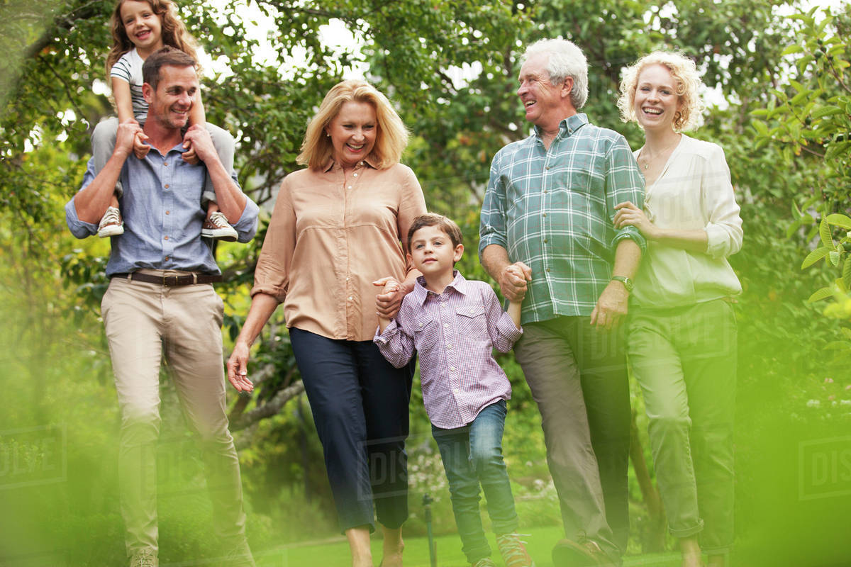 Multi-generation family walking in park - Royalty-free Stock Photo ...