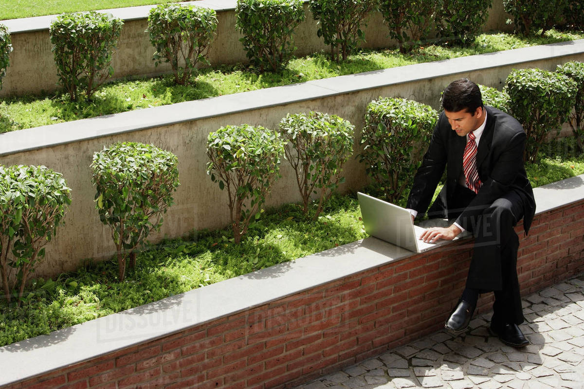 Businessman working outside, laptop computer - Royalty-free Stock Photo ...