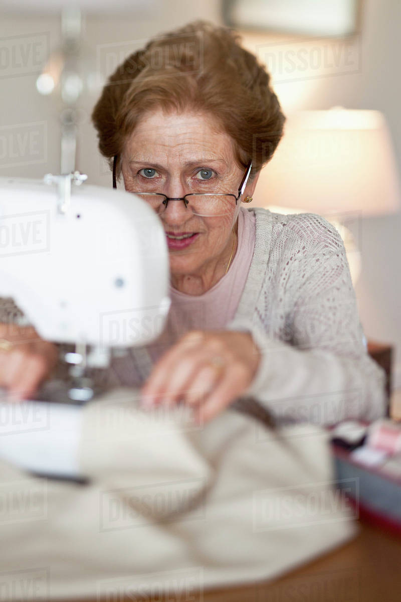 A senior woman sewing - Royalty-free Stock Photo | Dissolve
