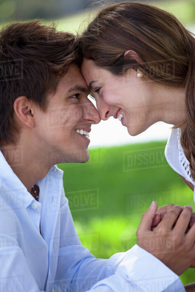 A young couple face to face - Stock Photo - Dissolve