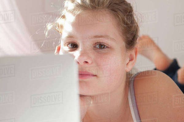 Girl at computer - Stock Photo - Dissolve