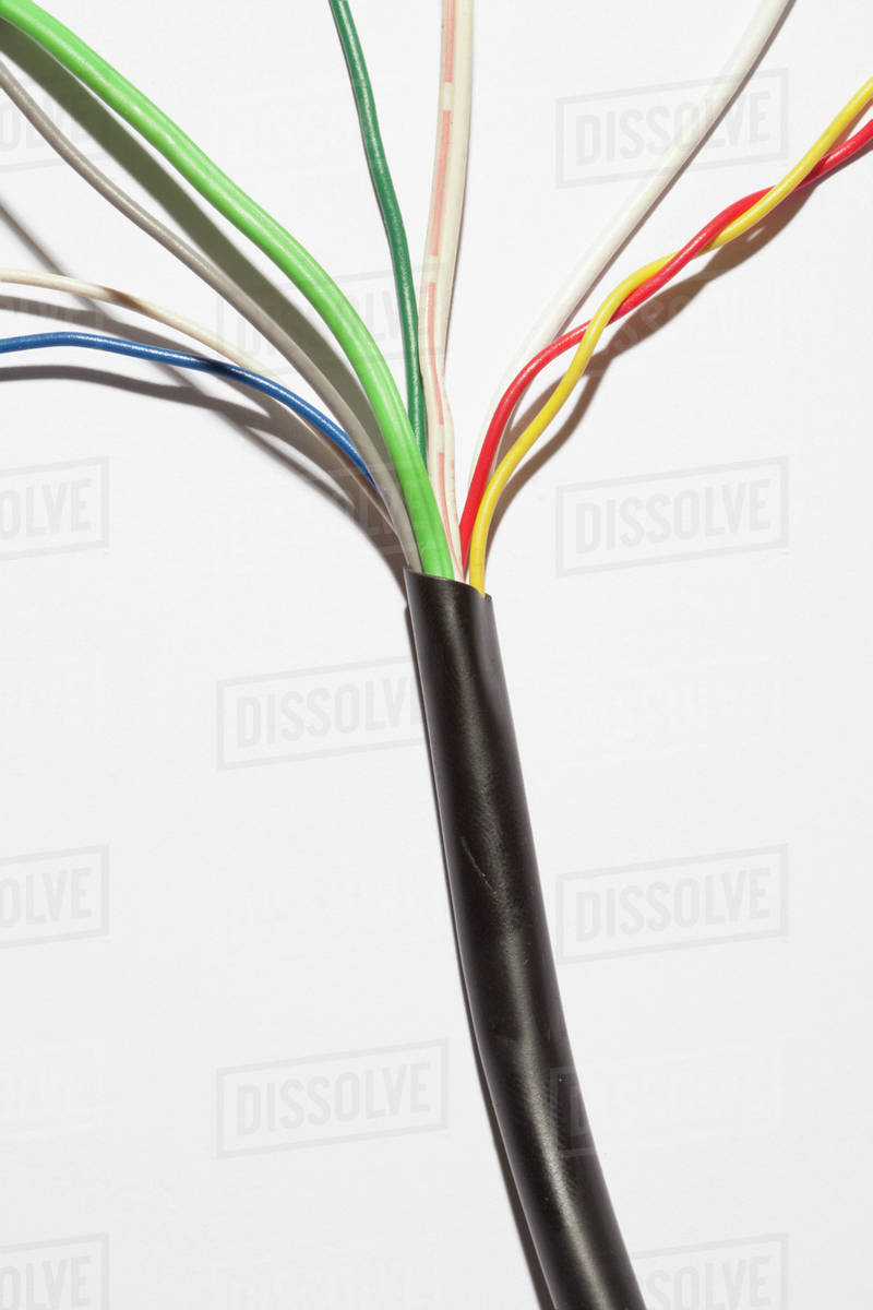 A cable with different colored exposed wires spreading out from it ...
