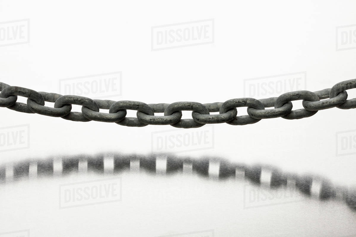 A hanging heavy metal chain - Stock Photo - Dissolve