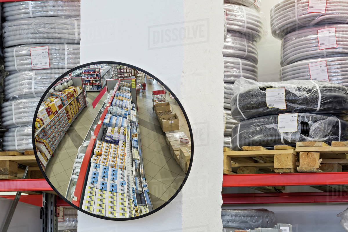 Parabolic mirror in warehouse store - Stock Photo - Dissolve