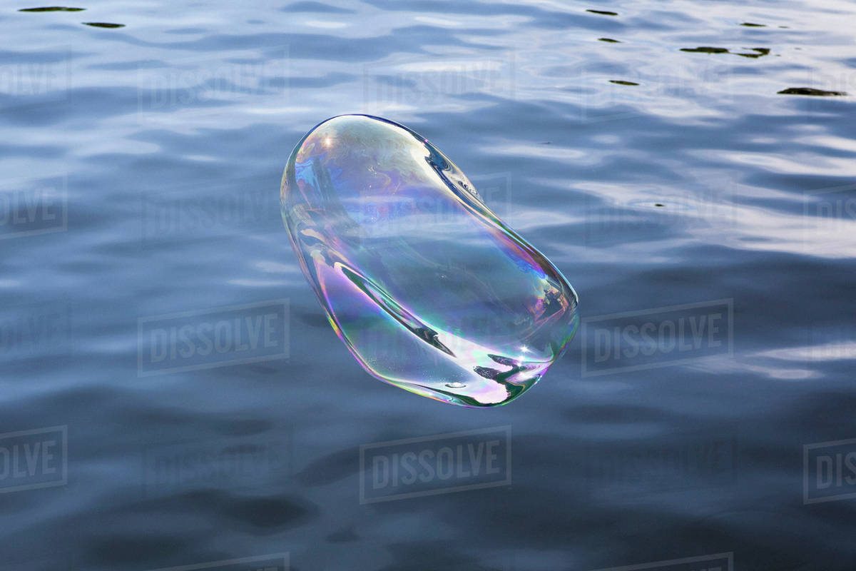 High angle view of bubble over water - Royalty-free Stock Photo | Dissolve