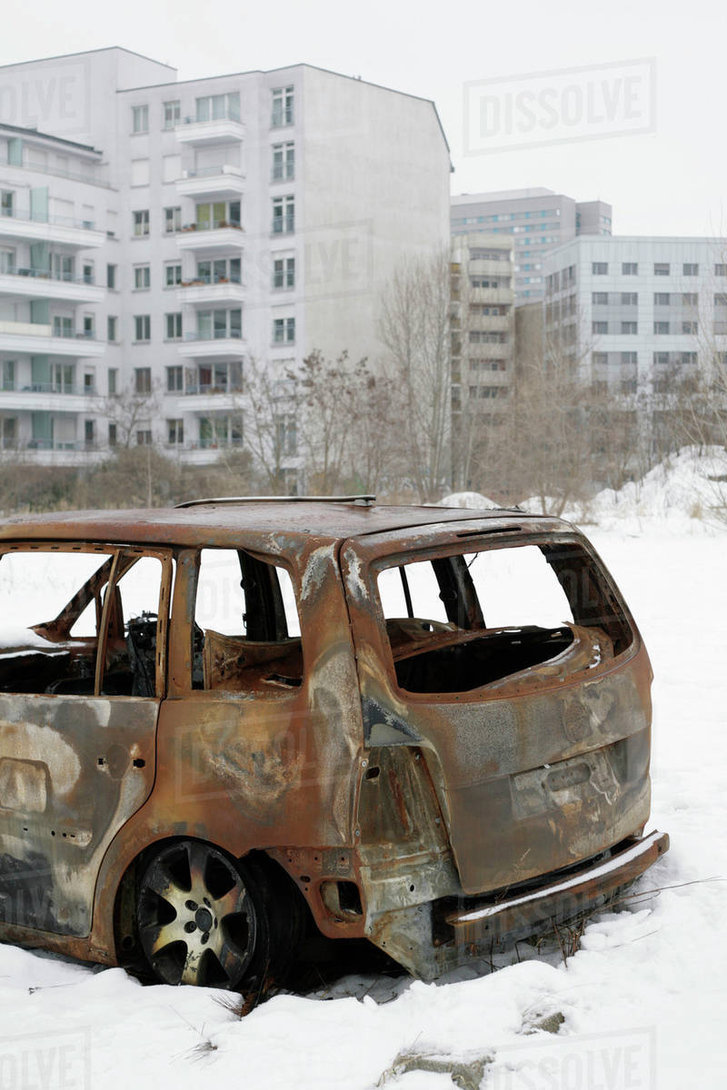 A burned out car abandoned in the snow - Royalty-free Stock Photo ...