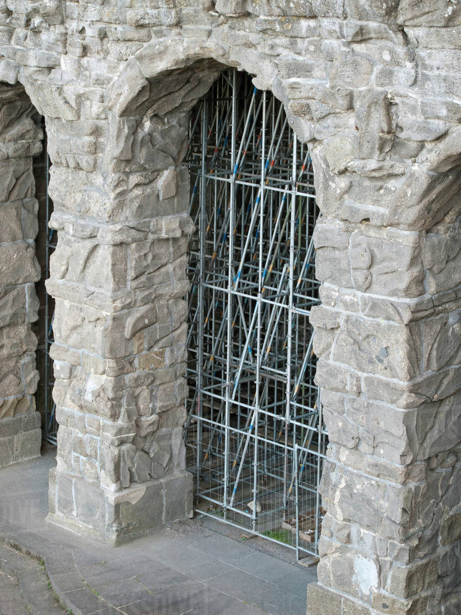 Scaffolding in stone archway - Royalty-free Stock Photo | Dissolve