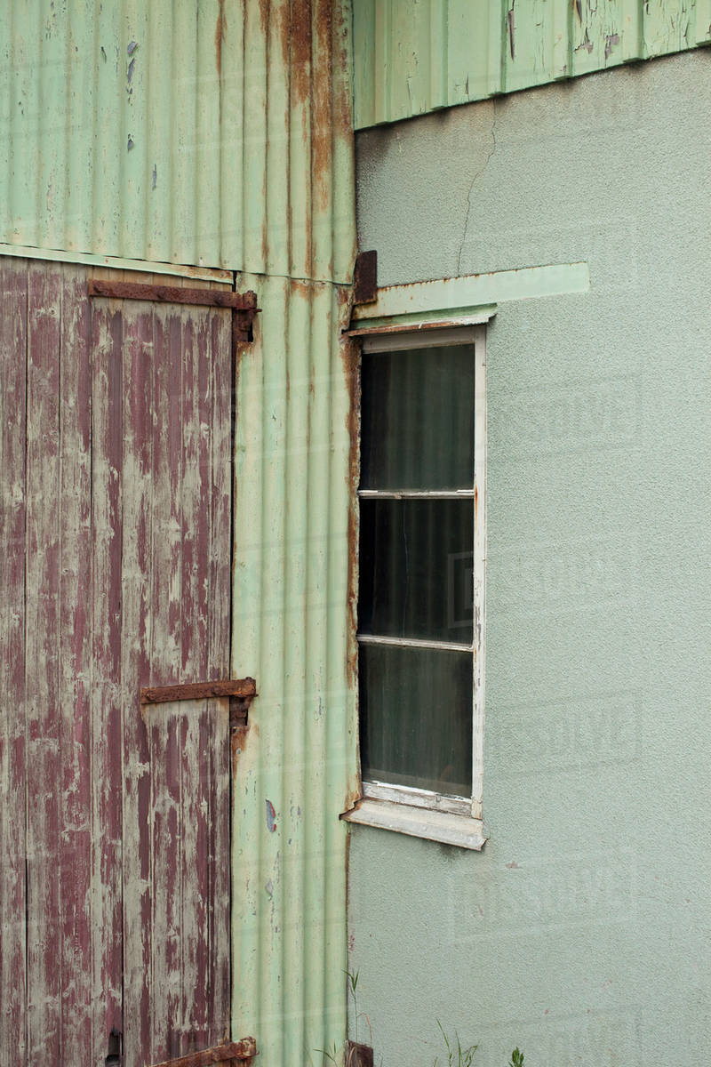 A run down facade of a building - Royalty-free Stock Photo | Dissolve