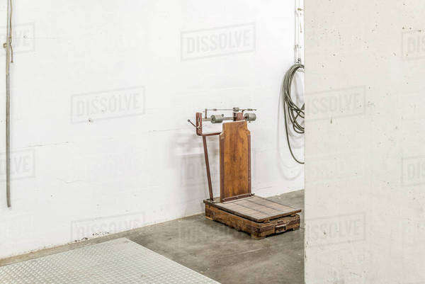 Old-fashioned weight scale against white background - Stock Photo ...