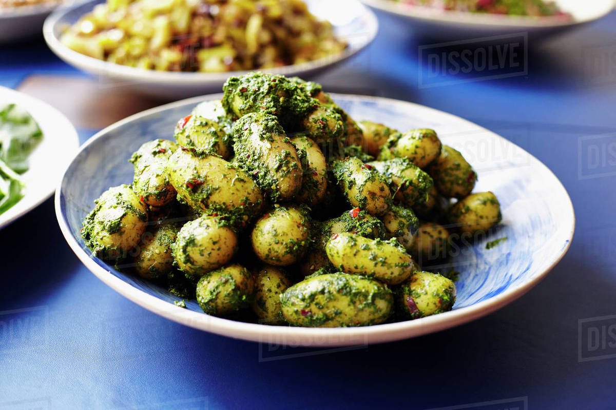 Close-up of prepared potatoes served in plate at table - Royalty-free ...