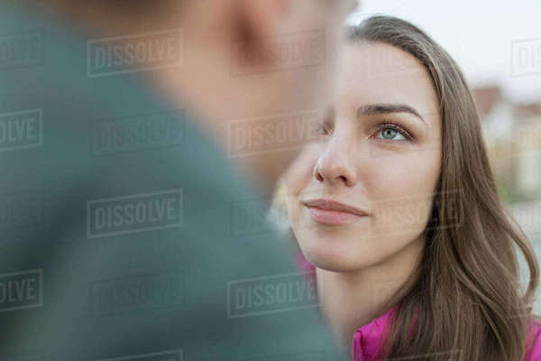 Close-up of young woman looking at man - Royalty-free Stock Photo ...