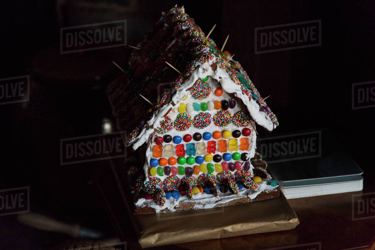 Close-up of gingerbread house on table - Stock Photo - Dissolve